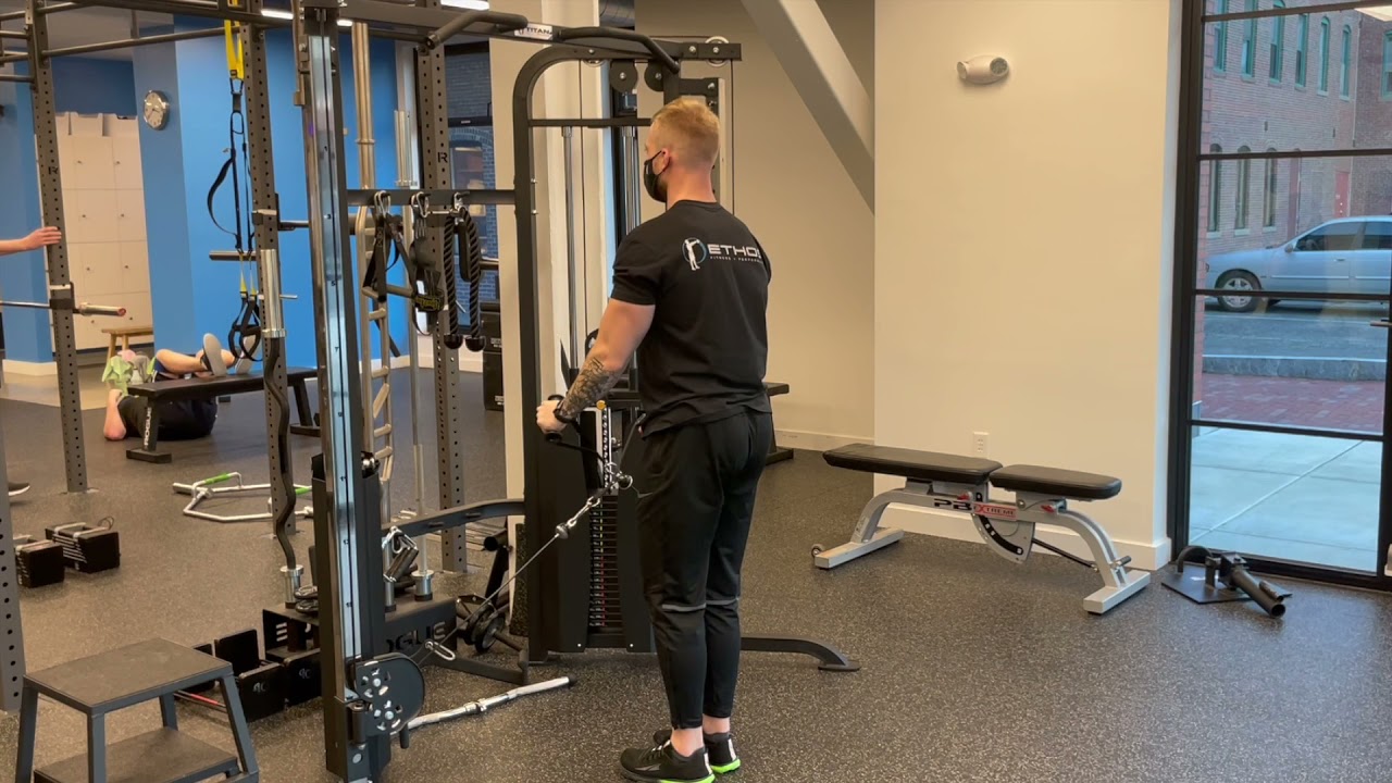 Standing bilateral cable cross-body lateral raise - YouTube