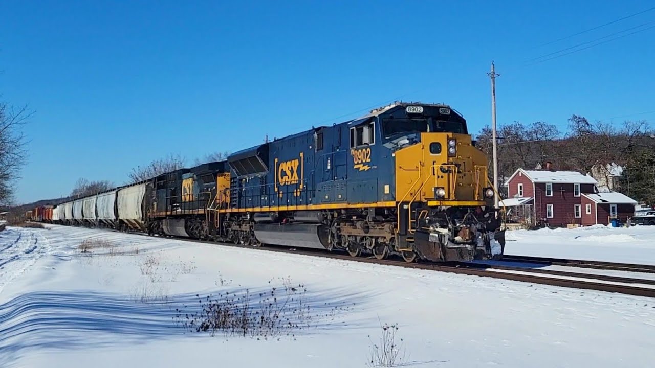 new EMD "ST70AH" leads a mixed freight train - YouTube