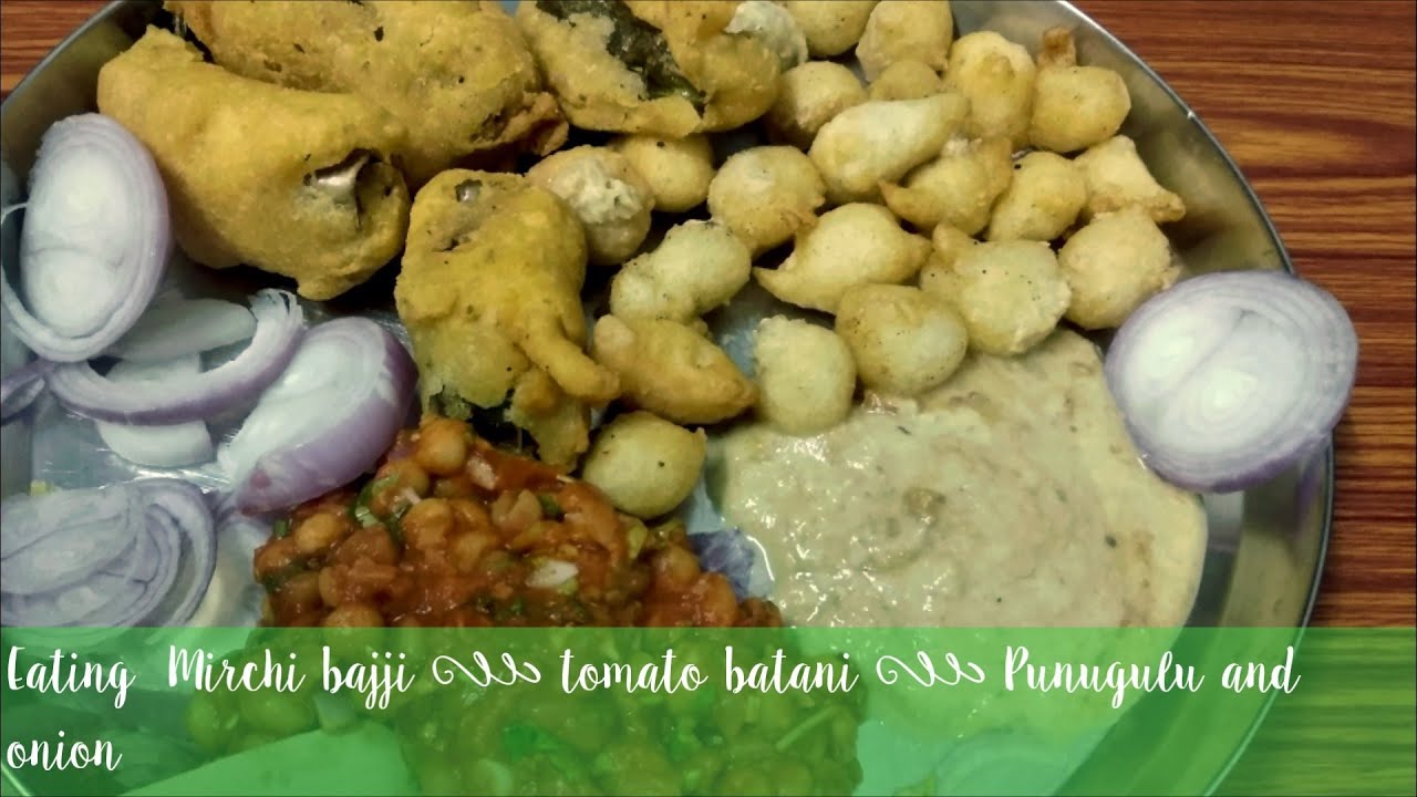 Eating Mirchibajji,tomato batani,Punugulu and onion(eating show) - YouTube