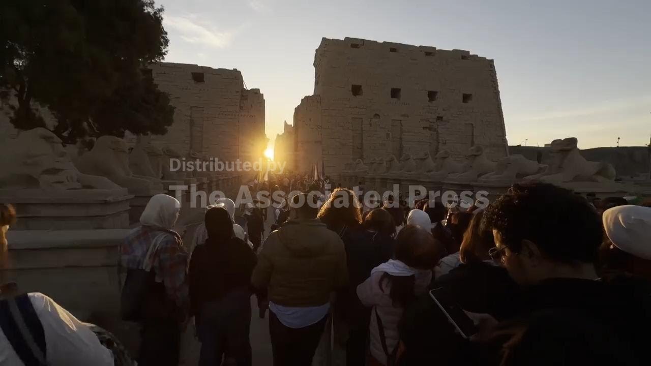 Visitors watch sun align with ancient Luxor temple on Winter Solstice ...