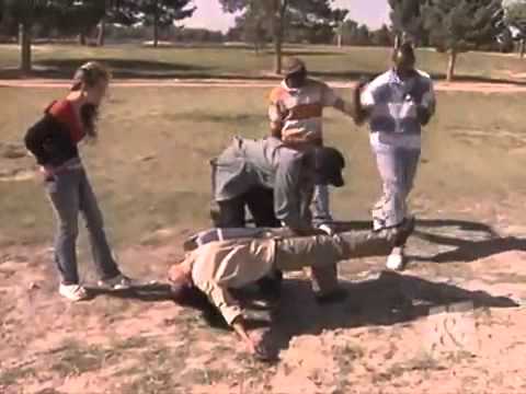 Criss Angel makes a girl levitate in front of a crowd - YouTube