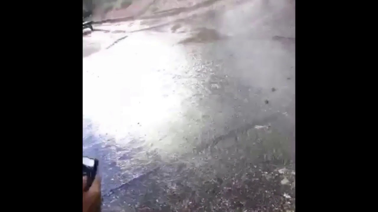CRAZY FLASH FLOOD!!! WATER SPRAYS OUT OF MANHOLE!?! - YouTube