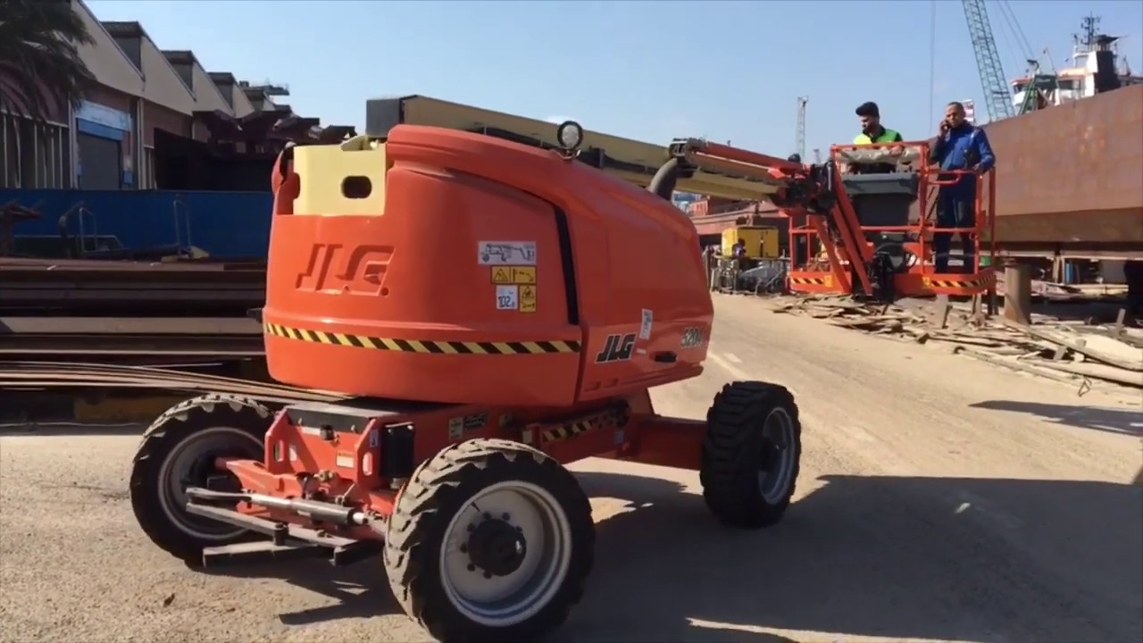 4×4 Manlift JLG 520AJ 18m articulating Boom lift تجريب رافعه افراد ...