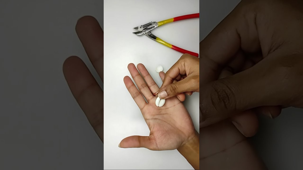 how to make hole in cowrie shell / how to break cowrie shell / #shorts ...