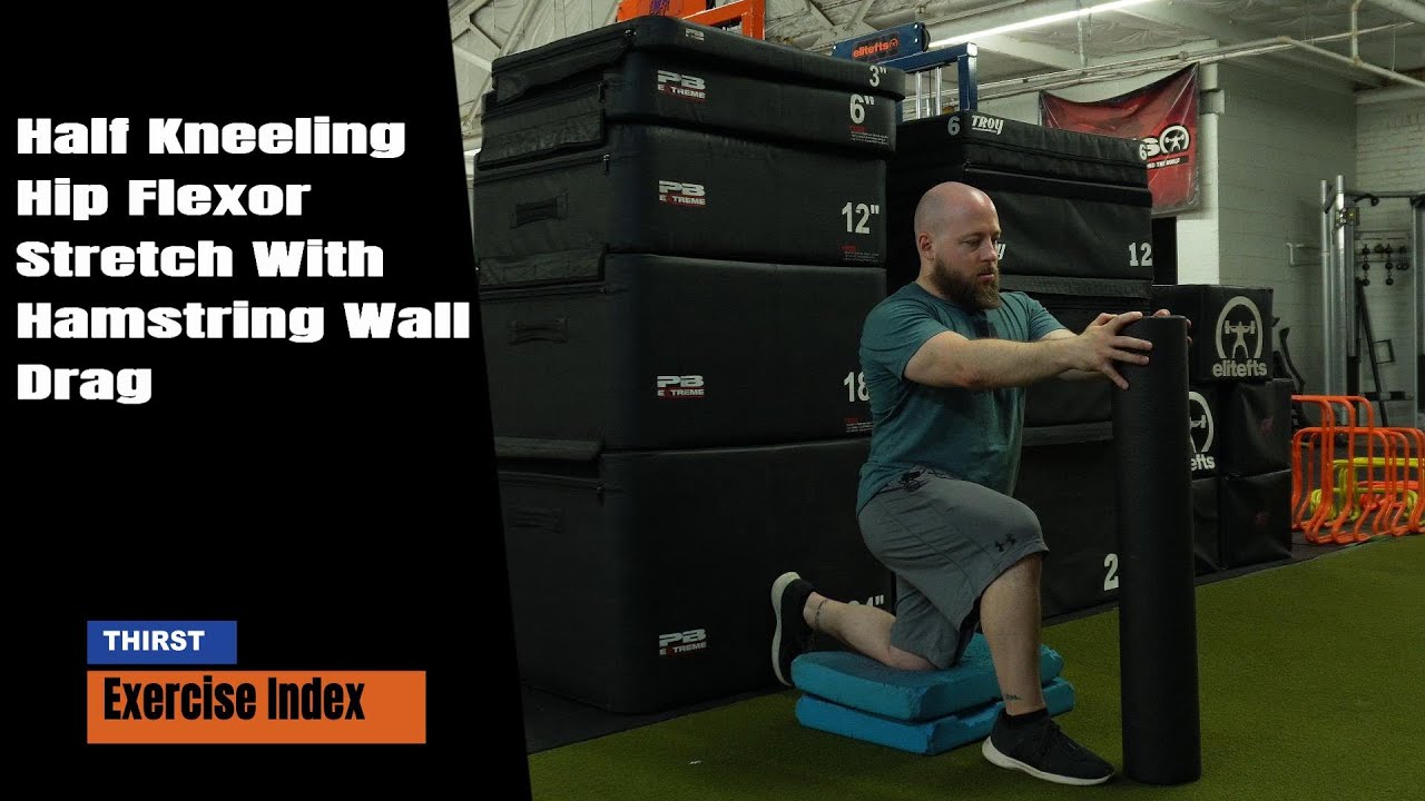 Half Kneeling Hip Flexor Stretch With Hamstring Wall Drag - THIRSTgym ...