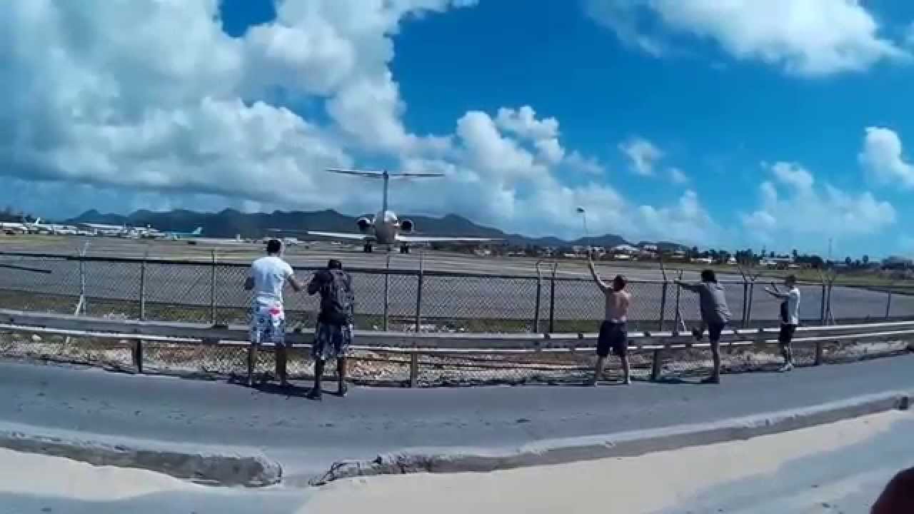 Jet Blast St Maarten extreme take off MD80 - YouTube