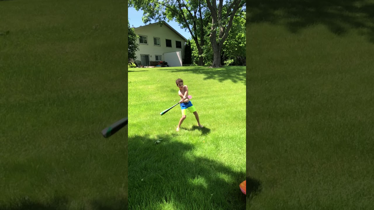 Slow motion water balloon batting practice - YouTube