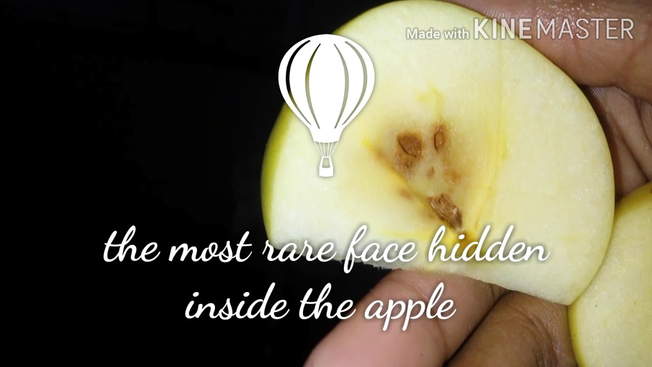 A rare and horror shape of face inside the apple - YouTube