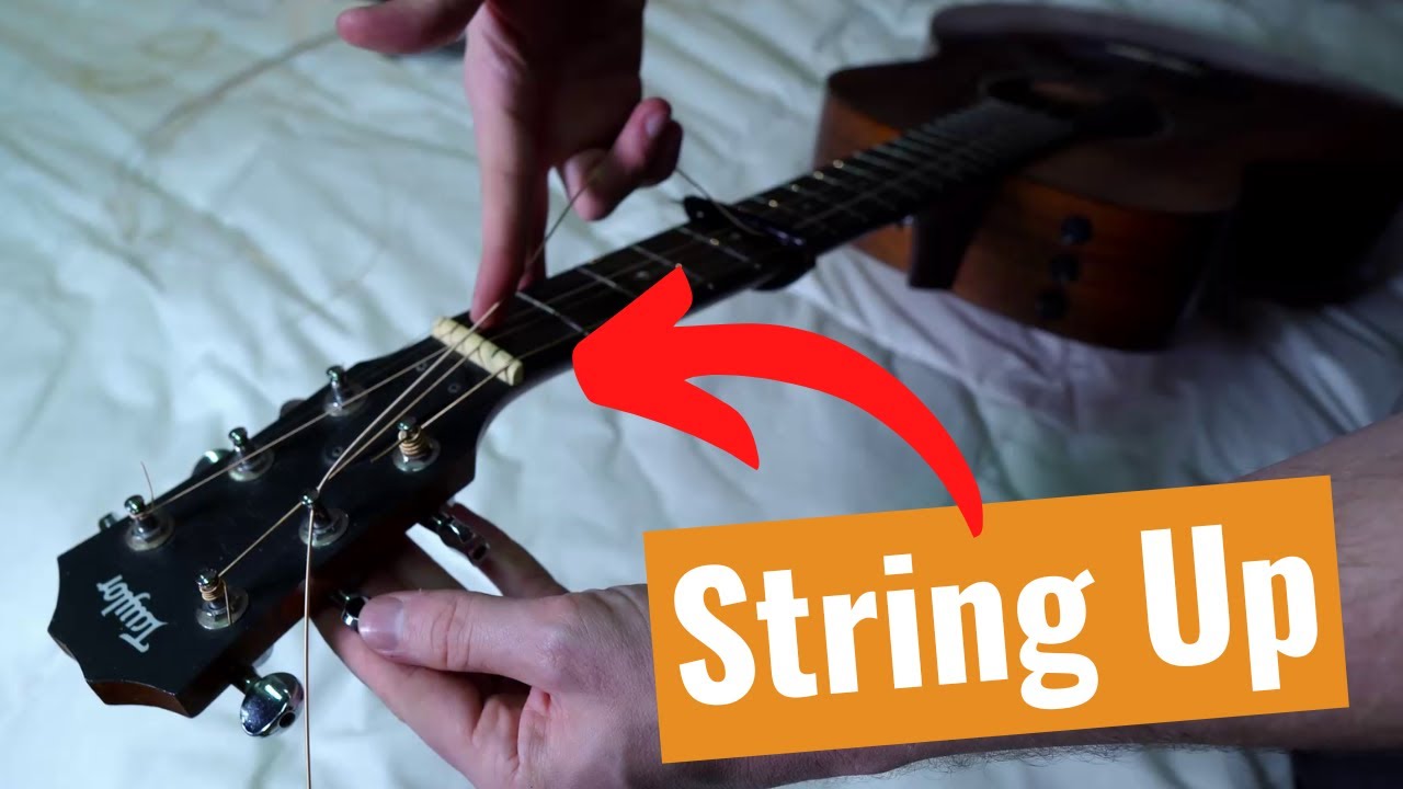 How To String Up Your Acoustic Guitar (Tips & Tricks) - YouTube