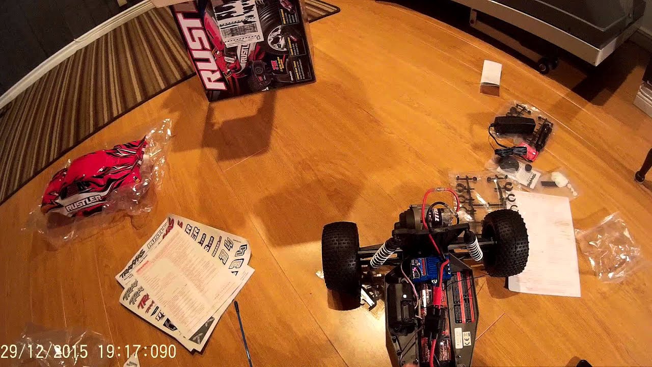 UNBOXING THE TRXXAS RUSTLER TITAN 12T PART 4 - YouTube