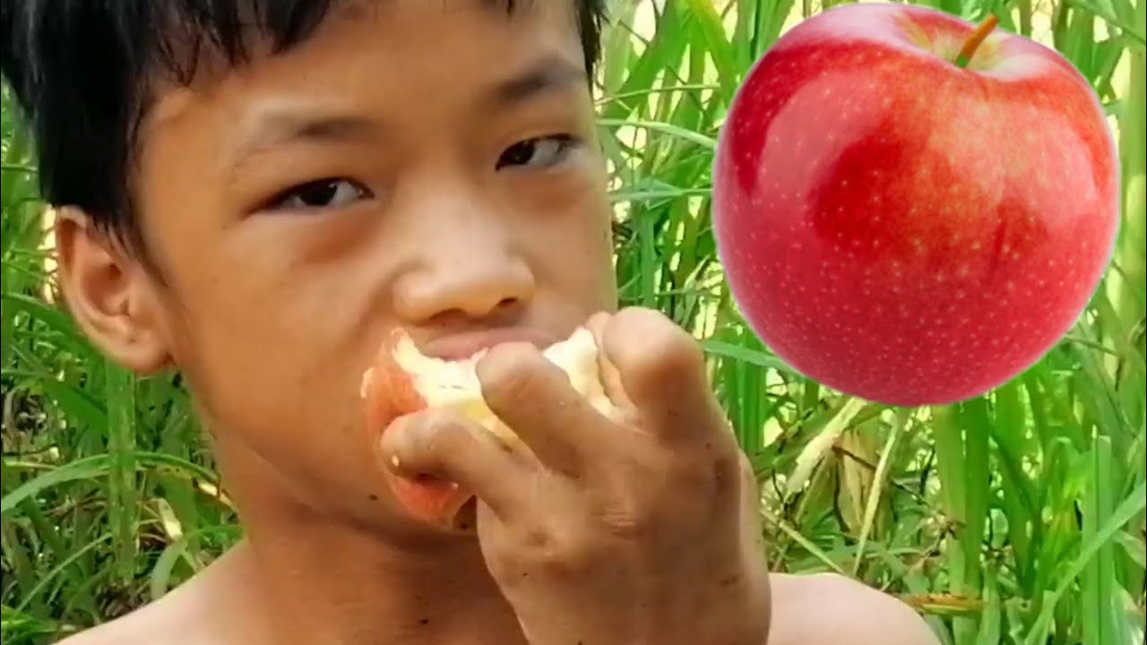 Primitive survival skills_boy eating apple so delicious - YouTube