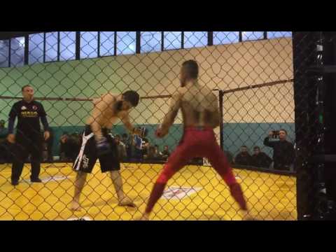 10 sn. KO / 10 sn.NAKAVT  (Kırmızı taytlı Türk sporcu Cihad Demirkol)