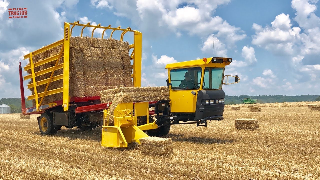 Harvesting Straw Bales New Holland H9870 Stack Cruiser - YouTube
