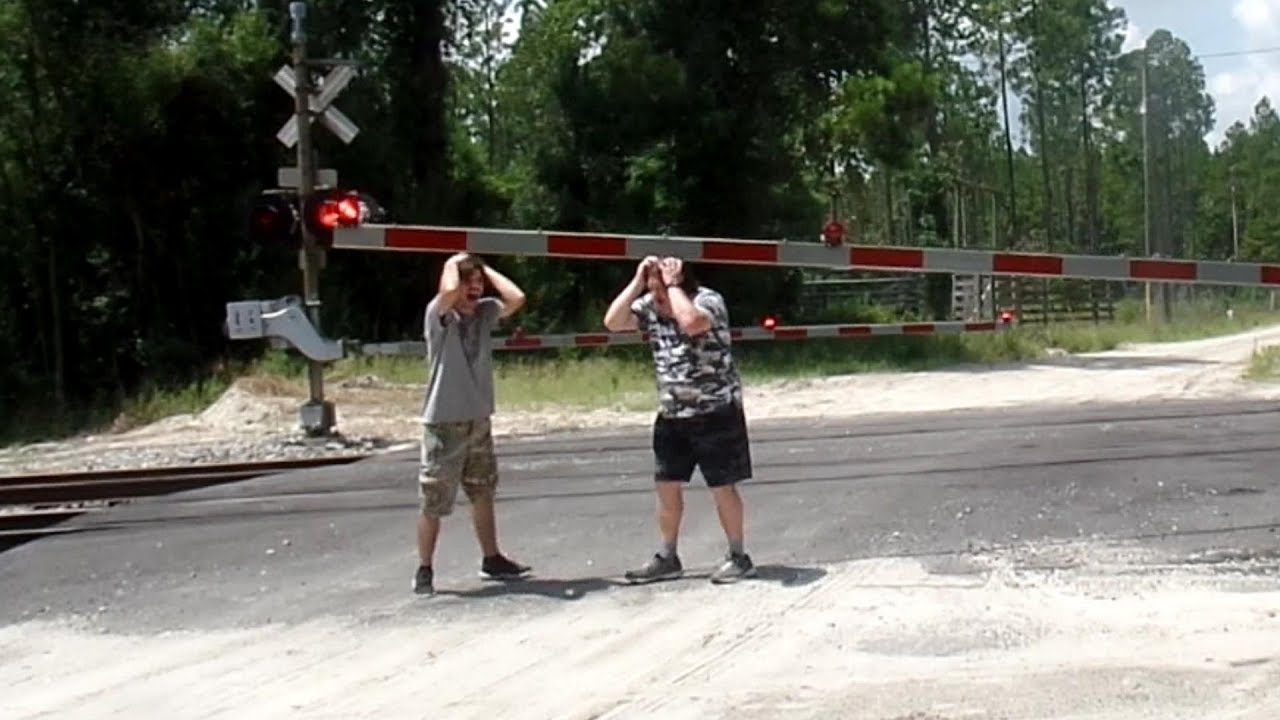 Train Gate Hits Couple Of Guys On The Head - YouTube
