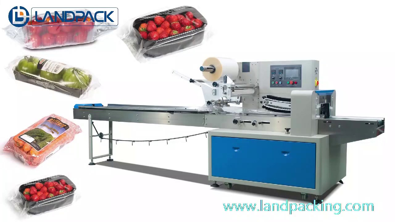 Tray flow packing machine - YouTube