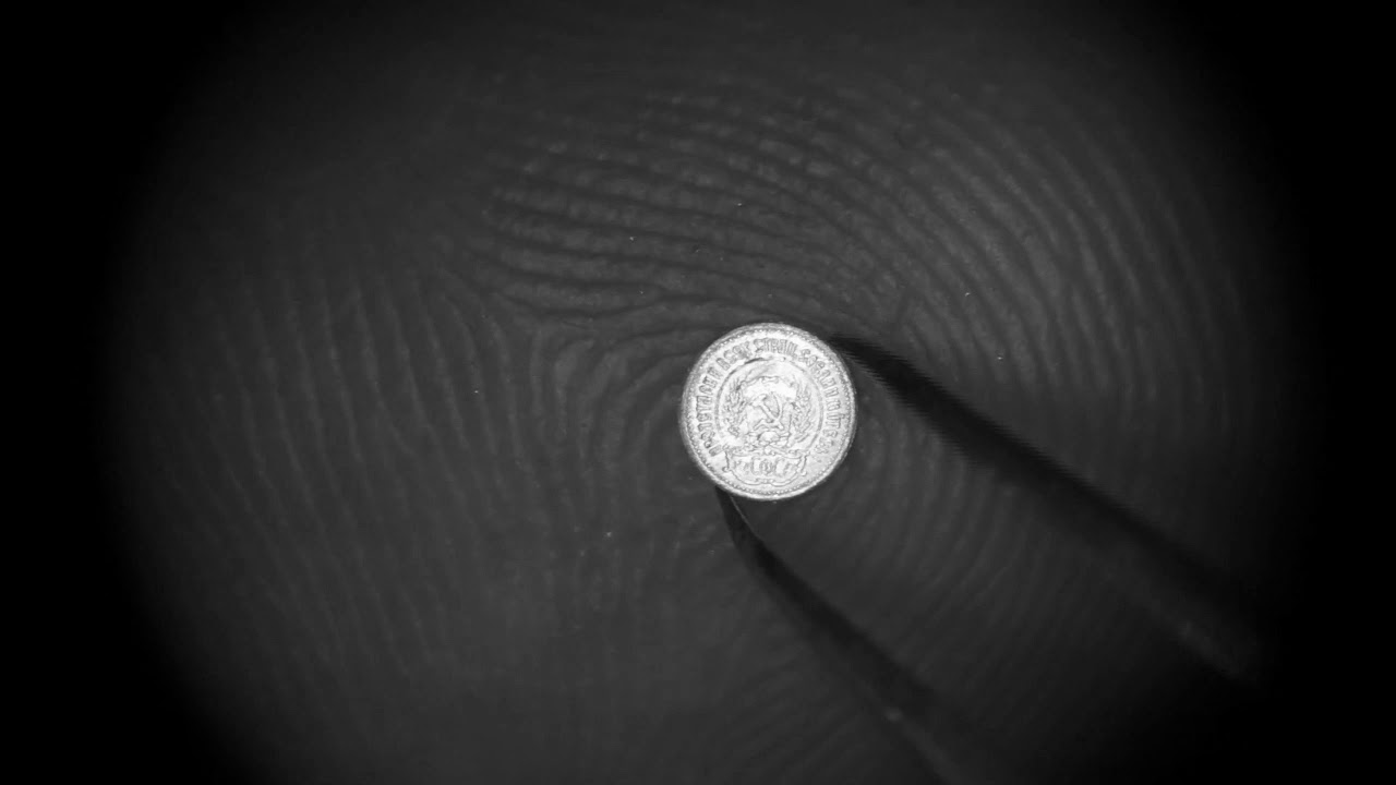 Guinness Record: Artist Makes Worlds Smallest Coin - YouTube