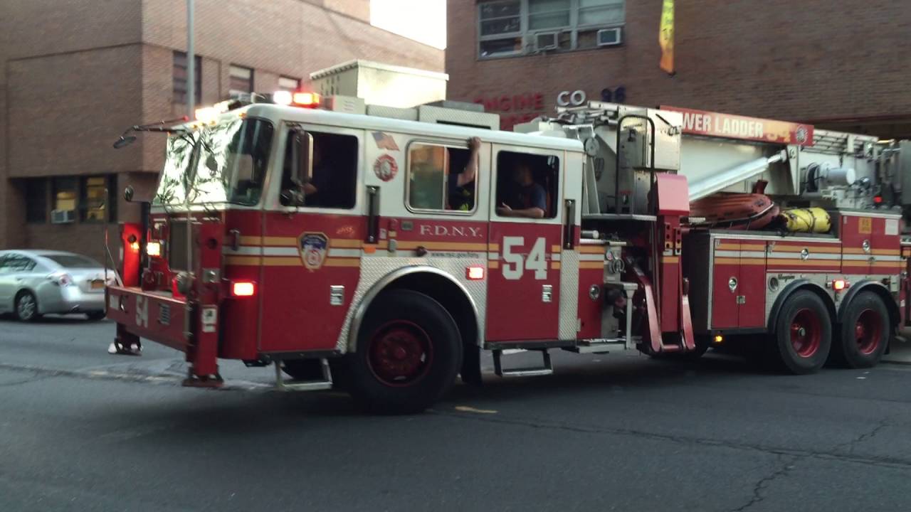 FDNY TOWER LADDER 54 RESPONDING FROM QUARTERS ON STORY AVENUE IN ...