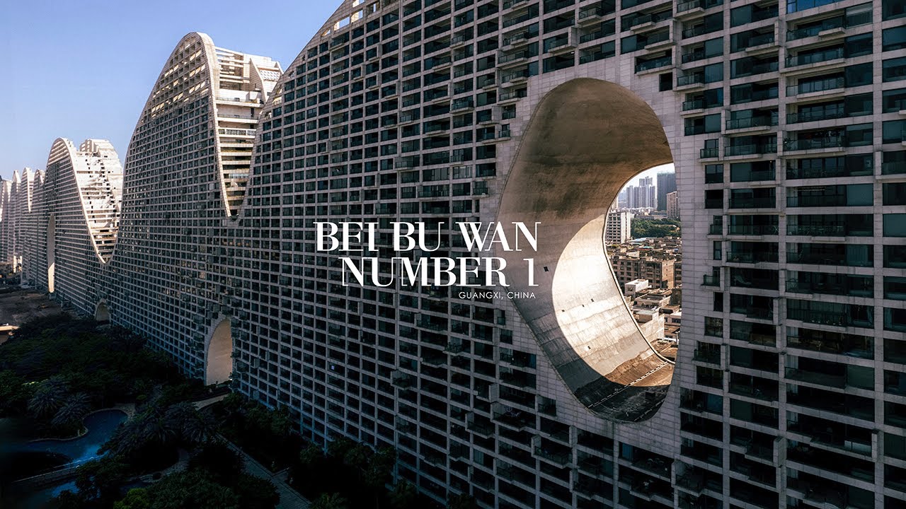 This building with a giant hole in China - YouTube