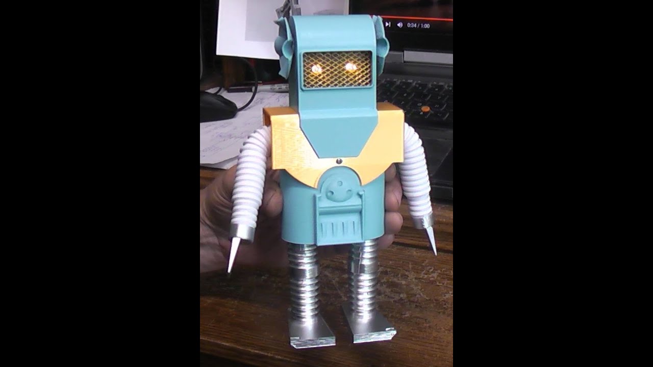 New version of 3d printed Foki robot. Lit eyes, moving arms and walking ...