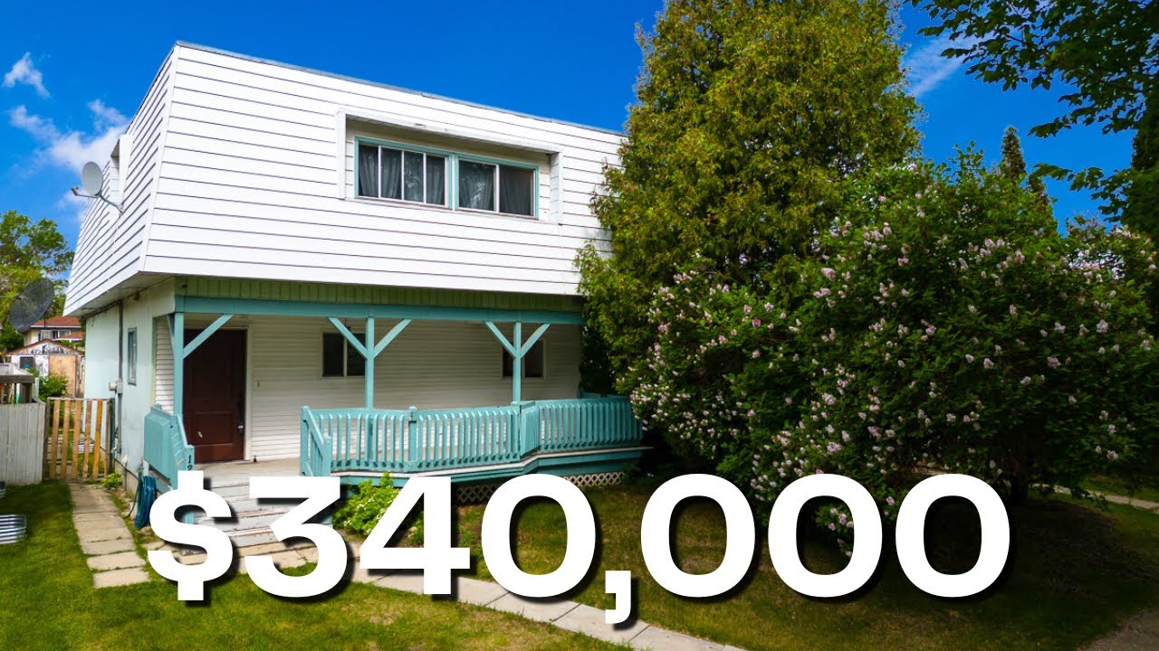 Peek Inside This Unique Home in Balwin with Open to Above Living Room ...