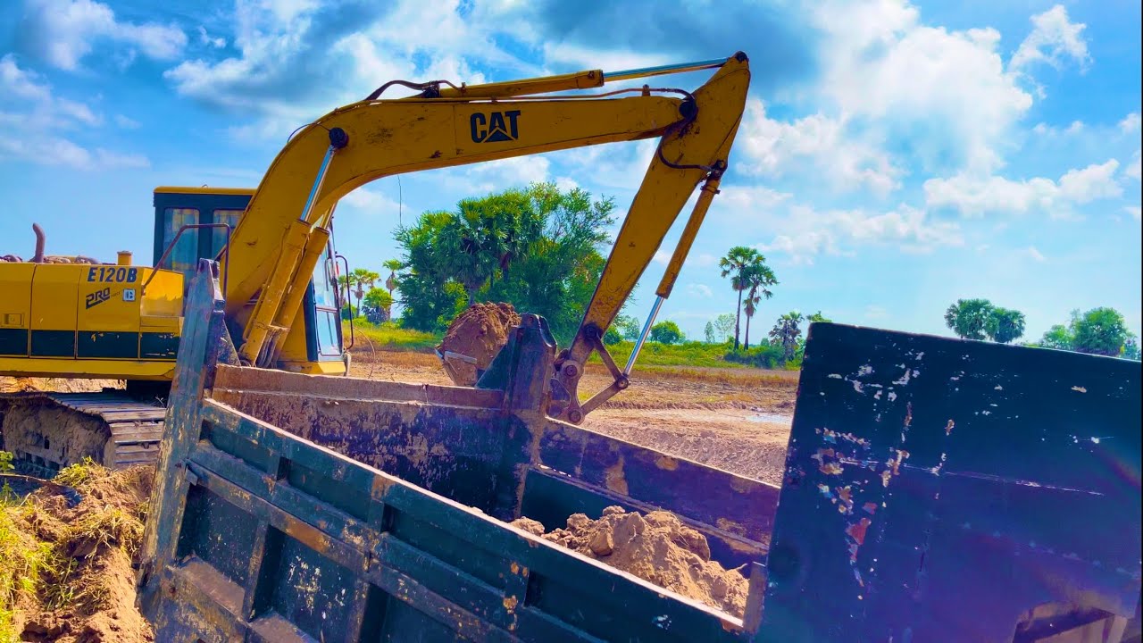 Excavator CAT Loading - YouTube