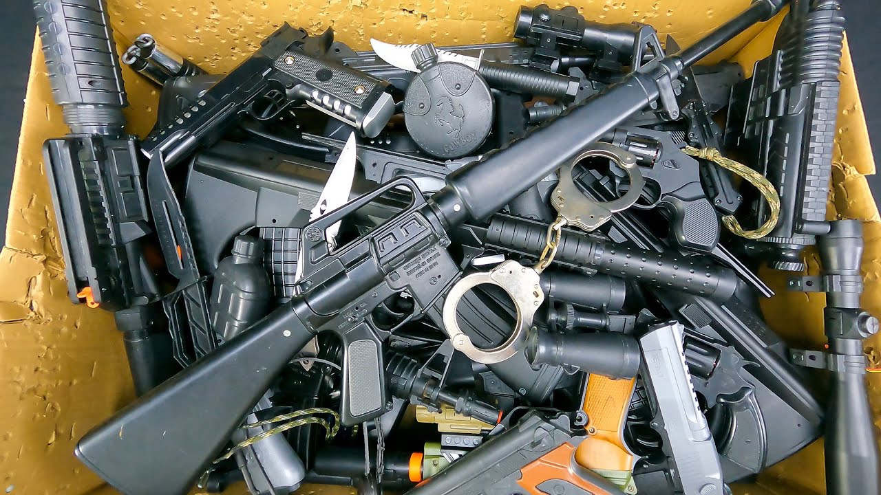 Box of Toy Realistic Black Color Guns, Bead Shooter And Capsule ...