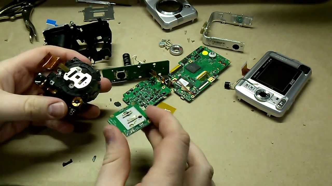 Taking apart and old DXG 503 digital camera - YouTube