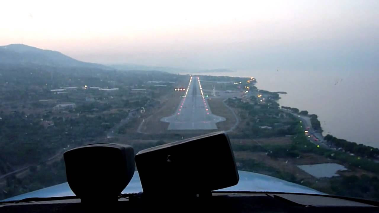 Right base, final and landing on runway 32 at LGMT, 4/8/2010, 2035LT ...