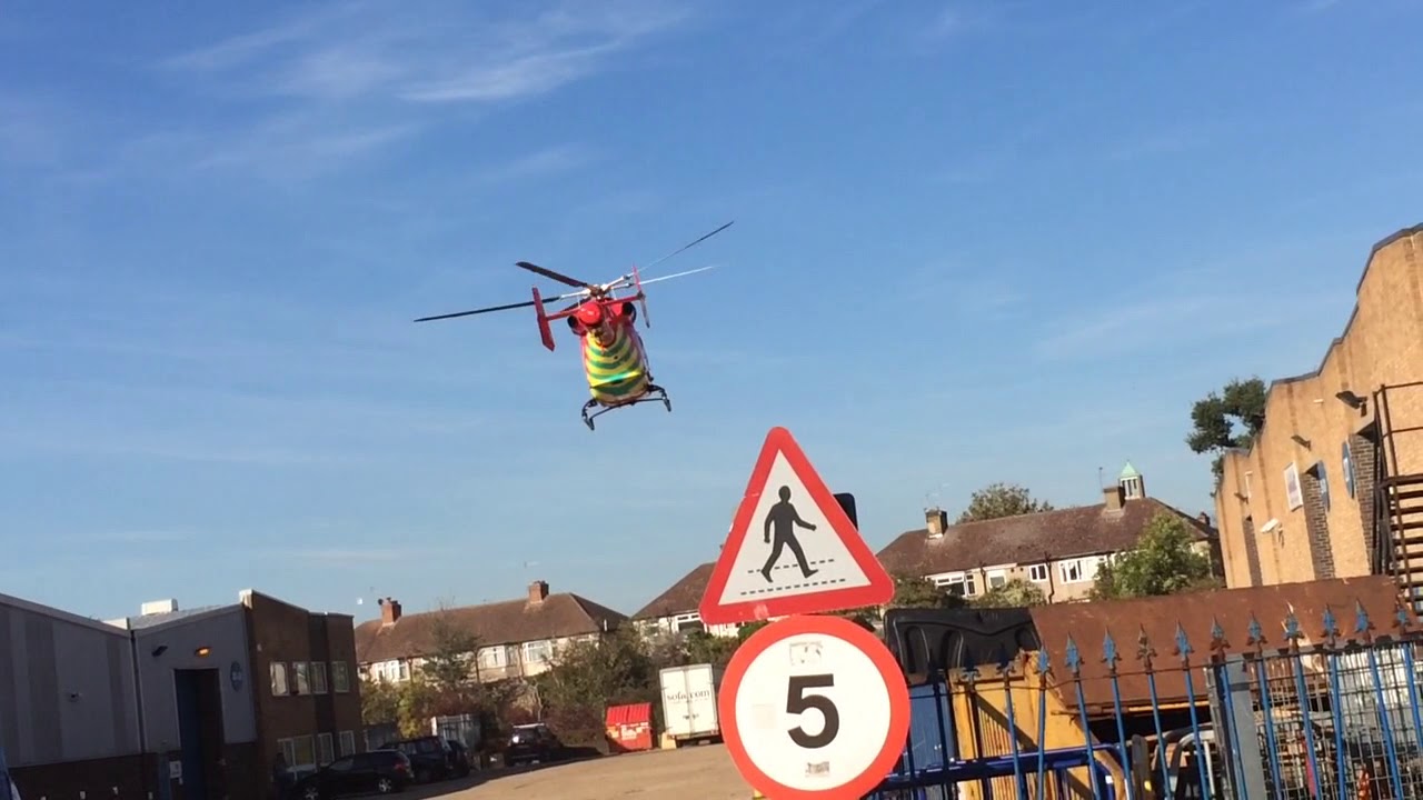 Hospital helicopter airlifting passenger - YouTube