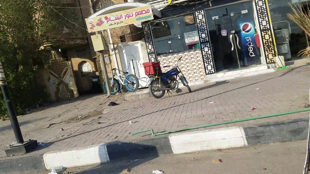 Iraq, Samawa - Travelling through the streets on a motor scooter - YouTube