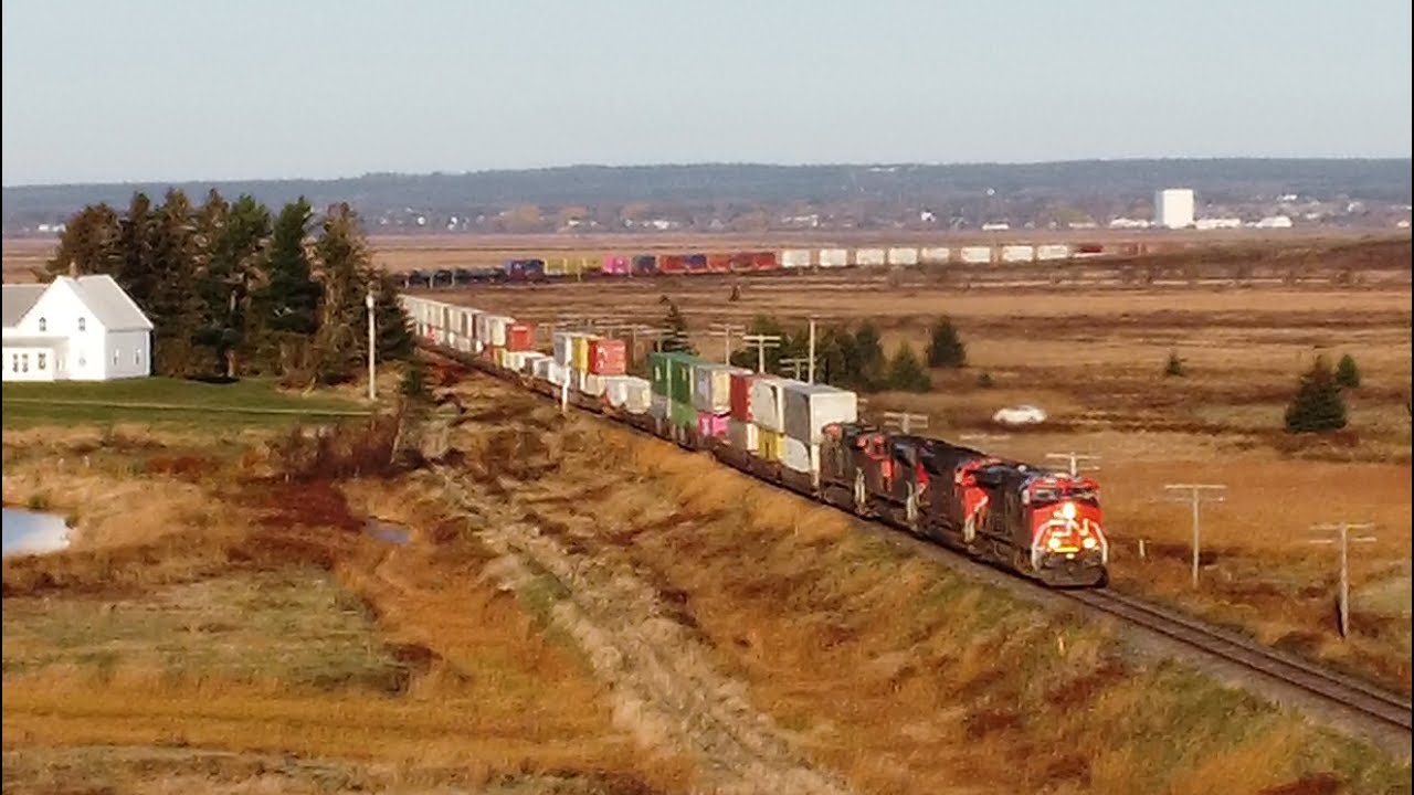 Awesome View! Long Stack Train CN 120 Crossing into Nova Scotia at ...