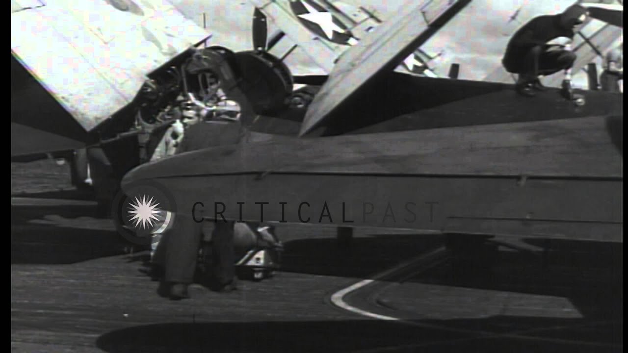 Pilot talks with his gunner on flight of a carrier of Task Force 38.3 ...