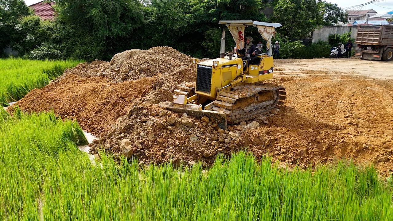 Incredible Land Filling On Green Rice Field Operating By Dozer Komatsu ...