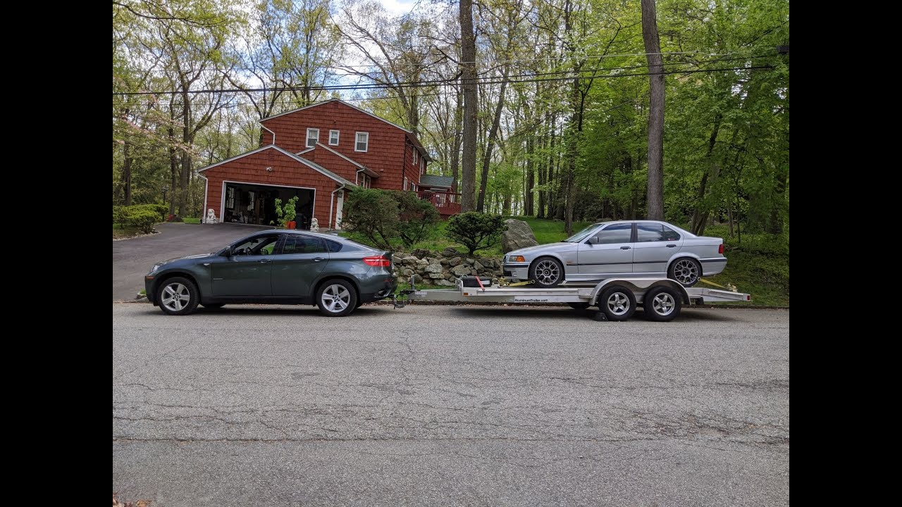 BMW E71 X6 35i towing E36 on ATC trailer with Curt Echo brake ...