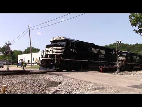 NS #7034 with NS OCS train 955 comes and stops to pick up employees - YouTube