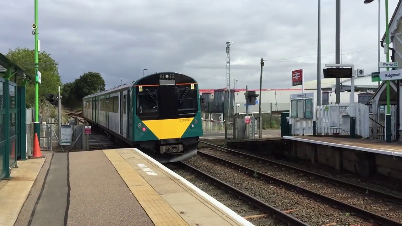 Bedford-Bletchley class 230 DMU 230:004 departs Ridgmont station - YouTube
