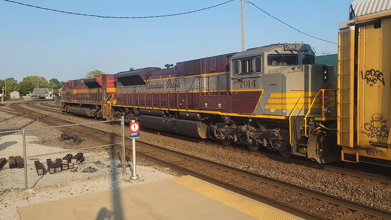 an eastbound cpkc Autorack passing Elkhart station with Cp 7014 - YouTube