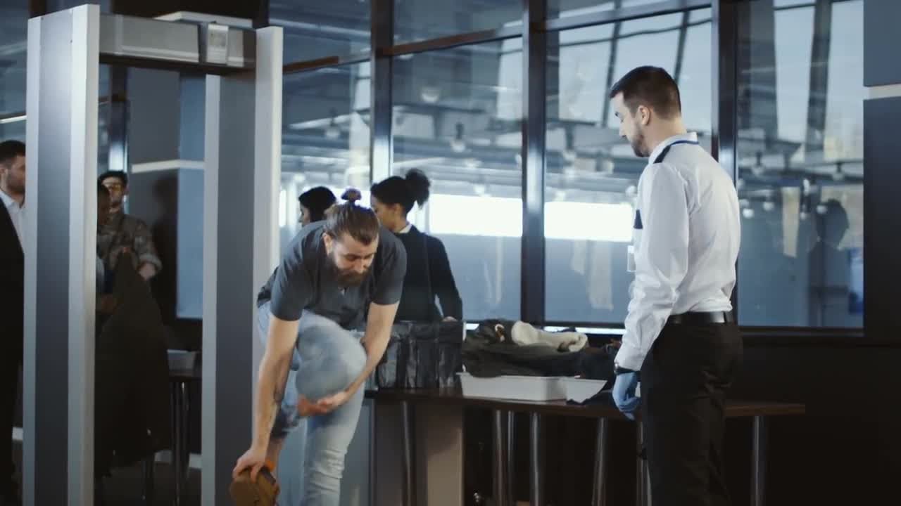 Airport Security Agent Frisking passenger Stock Video - YouTube