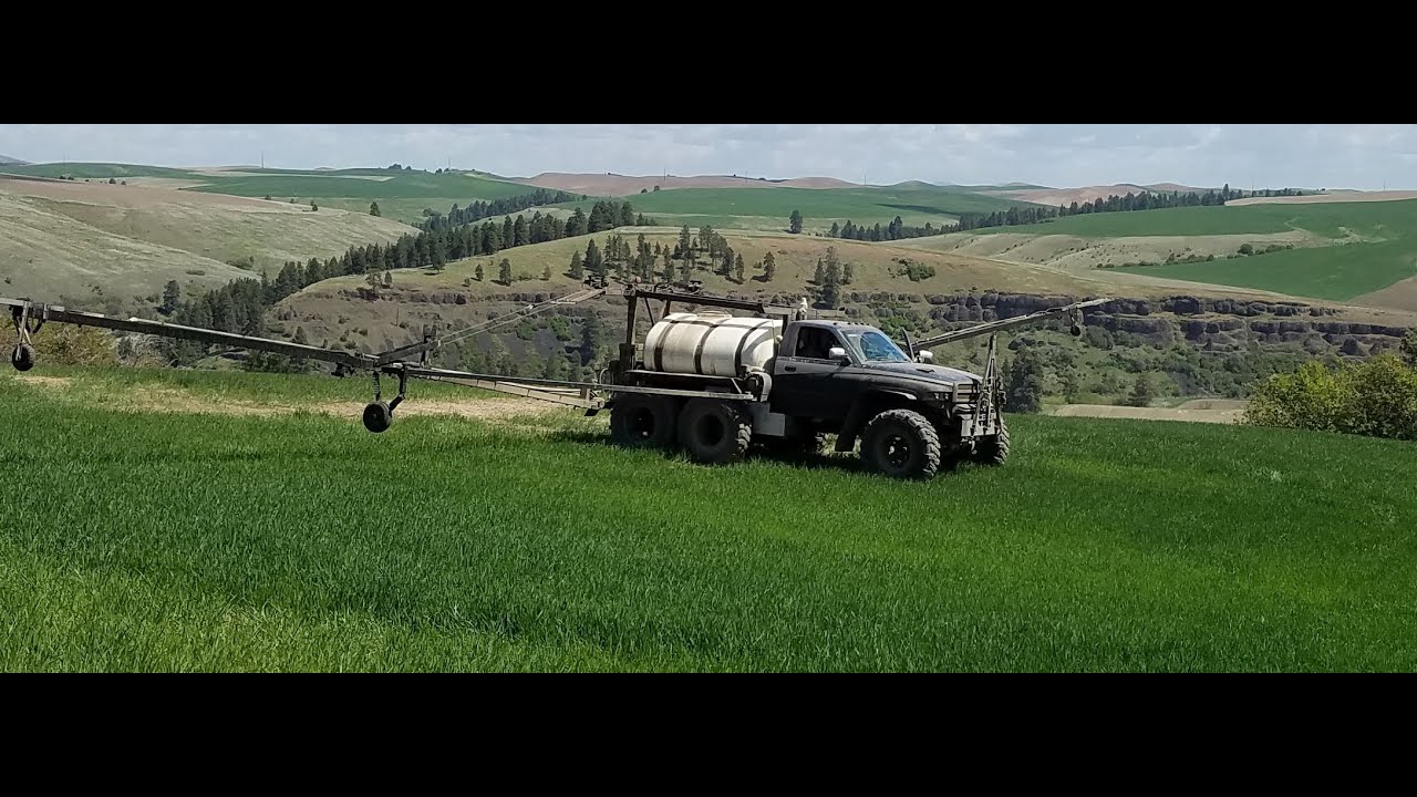 Custom built 6x6 pickup sprayer (self propelled sprayer) sprayes steep ...