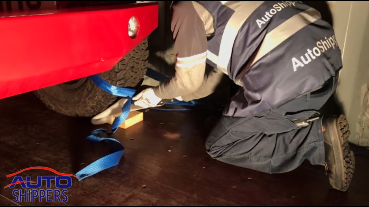 Loading 2 Land Rovers in a 40ft Container for Shipping Overseas ...