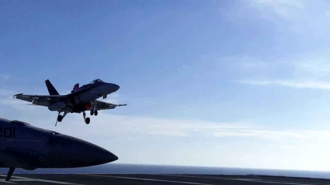 Arrested (tailhook) landing on an F18 Super Hornet on the aircraft ...