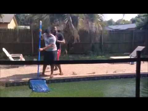 Guy gets pushed into pool. - YouTube