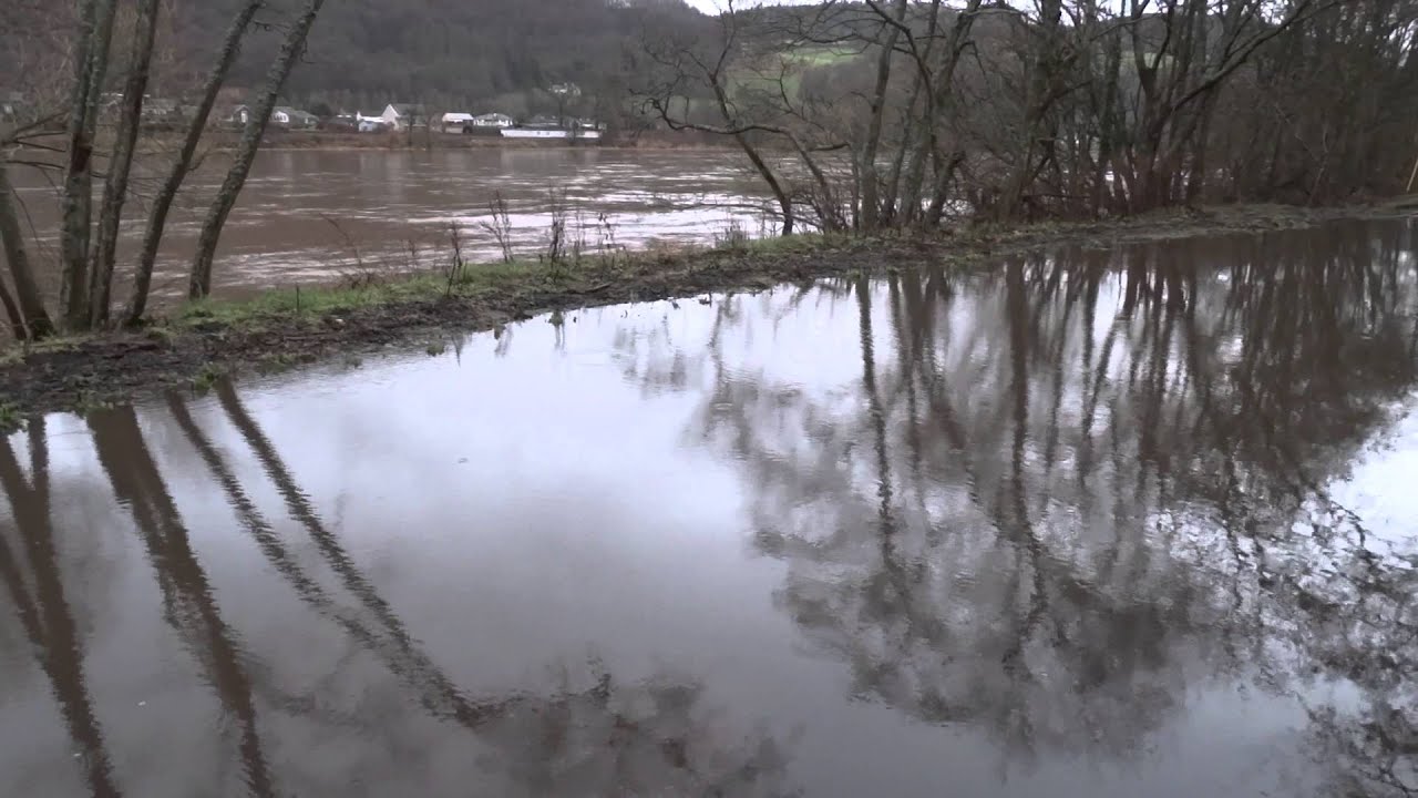 Heavy Rain And Flooding On Road By The River Tay Perthshire Scotland ...
