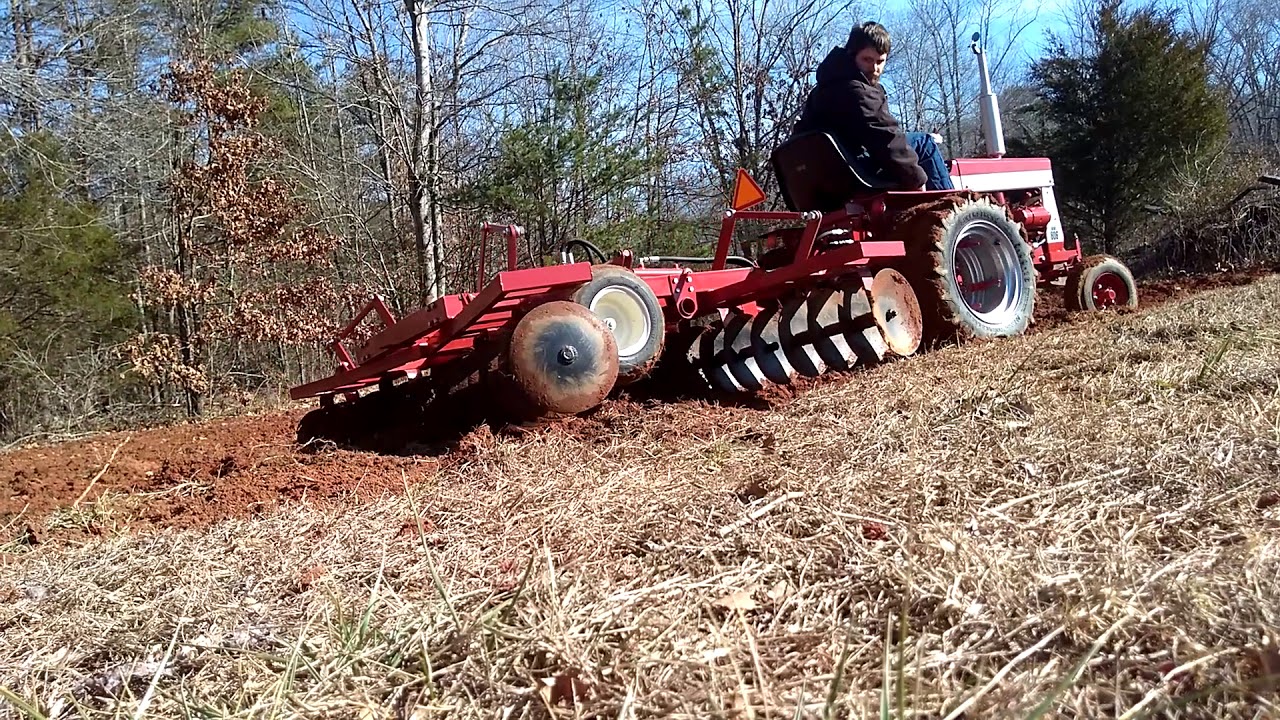 Discing with a custom built Cub cadet 124 - YouTube