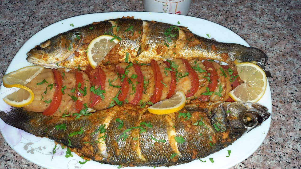 poisson loup de mer mariné au four facile à préparer et bon 😋😋 سمك ذئب ...