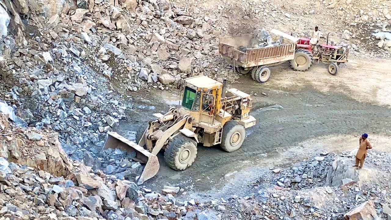 Massive Rock Loading Show By Powerful 966E Wheel Loader - YouTube