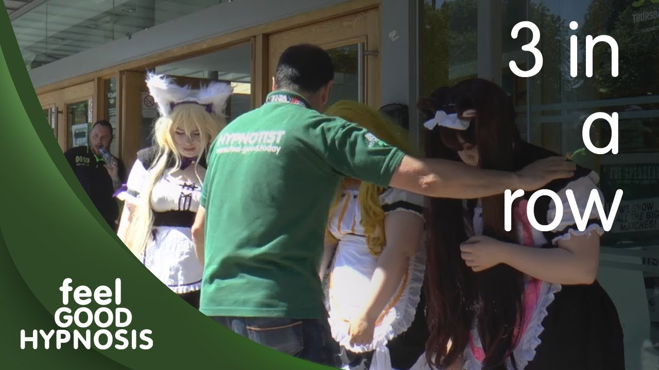 Three girls hypnotised in street hypnosis setup at Q-Con - YouTube
