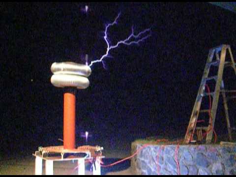 6.25" Tesla Coil running on 12kV 360mA NST bank. - YouTube