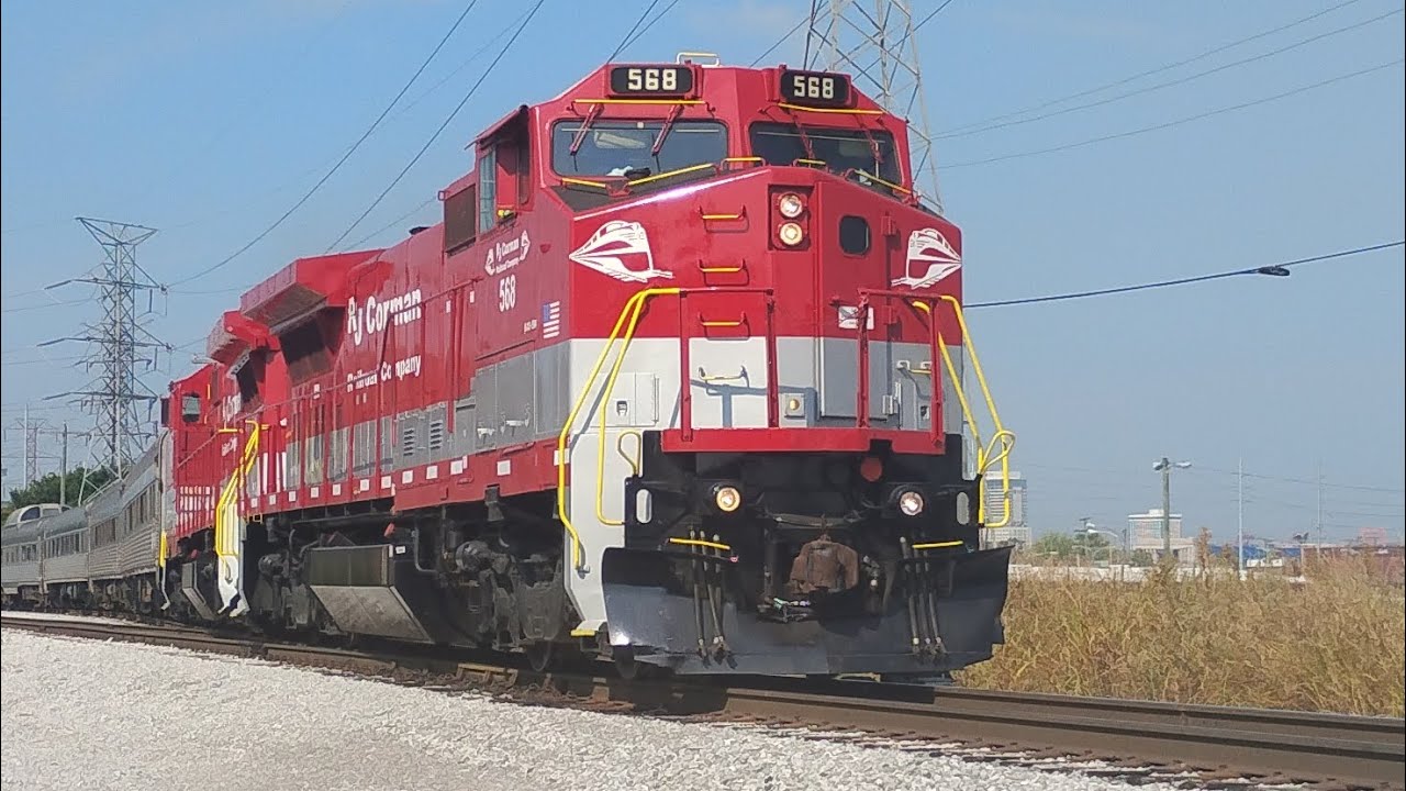 Rj corman 568 leads excursion train - YouTube