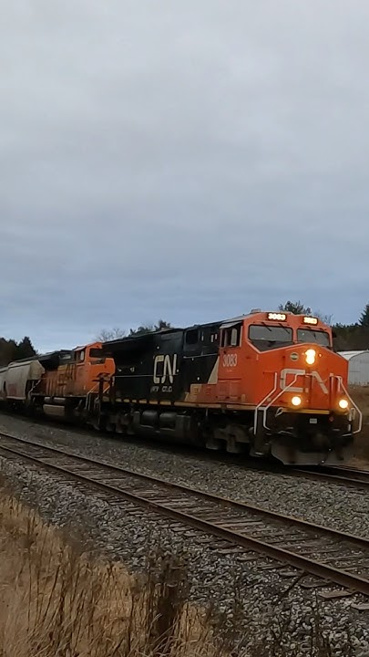 CN 3083 & BNSF 9173 LEAD CPKC 322 - YouTube